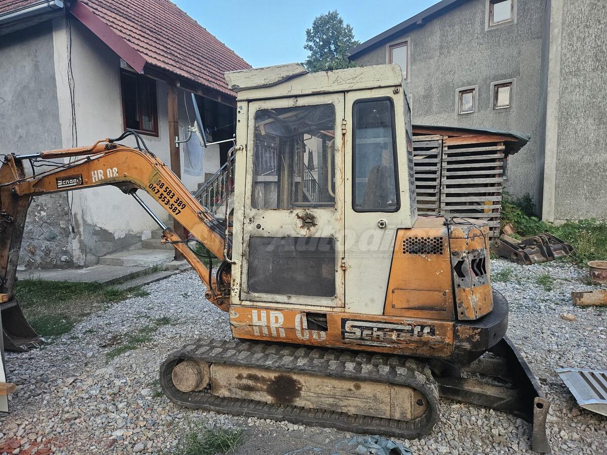 Schaeff - HR 08 - Cijena 9000 € - Crna Gora Kolašin Centar grada Radne ...
